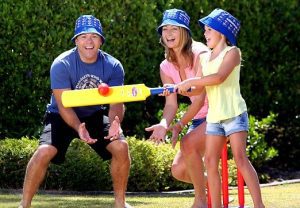 Game of backyard cricket is a fun and healthy activity at Christmas